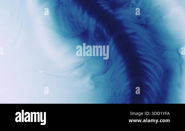 Paint spray. Spill fluid. Defocused blue white color splash pigment ...