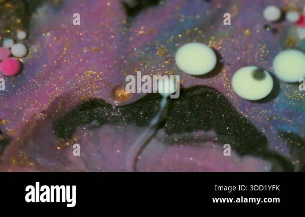 Ink shimmer splash. Bubble liquid. Defocused purple pink blue color ...