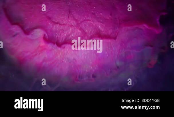 Pigment fluid drip. Defocused swirl. Glitter pink liquid paint pouring ...