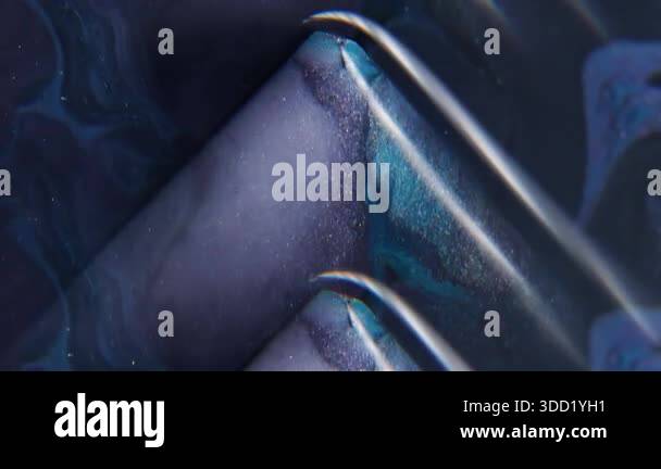 Ink splash. Geometric angle. Blur purple blue color shiny particles ...