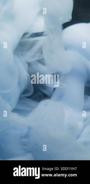 Vertical video. Smoke splash. Steam flow. White blue pigment haze ...