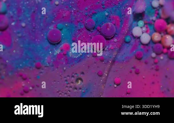 Marble emulsion. Paint water. Defocused purple pink blue colorful ...