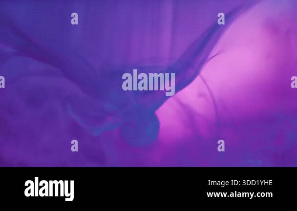 Ink fume. Neon water splash. Defocused blue purple color liquid glass ...