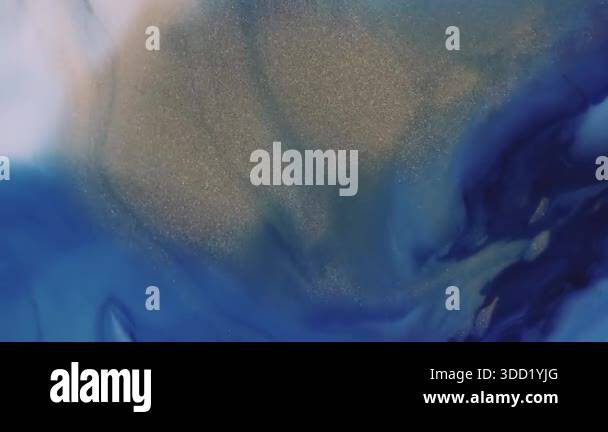 Glitter ink. Chemical paint. Defocused blue color yellow shiny pigment ...