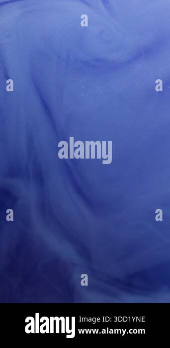 Vertical video. Smoke vortex. Steam flow. Blue purple white pigment ...