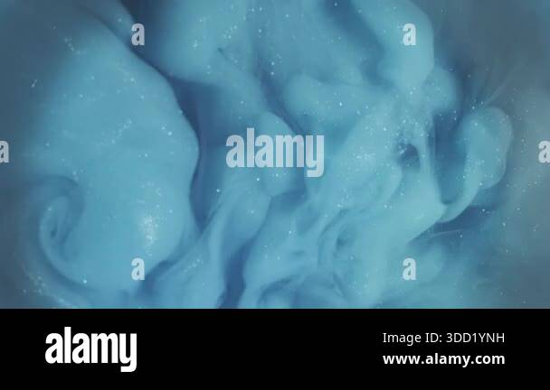 Glitter paint. Ink background. Defocused blue color splash shimmer ...