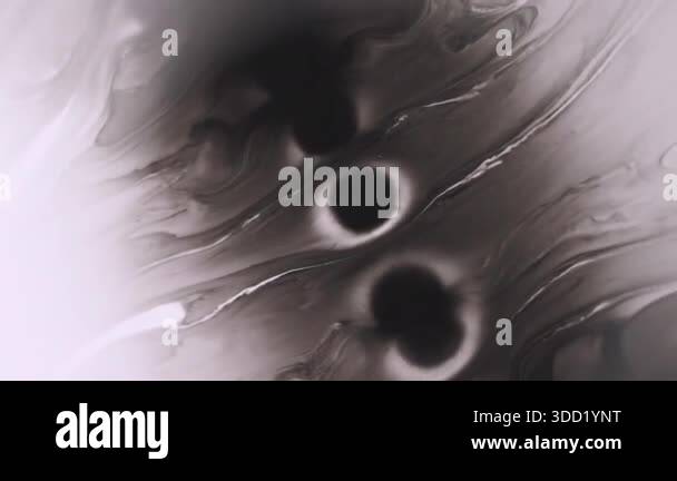 Paint spill. Spreading ink. Defocused black white color pigment droplet ...