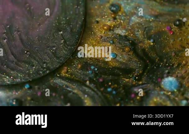 Paint fluid. Oil bubbles. Defocused yellow blue purple color acrylic ...