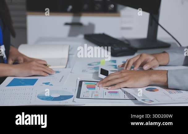 Close up view hands of businessman using calculator and doing ...