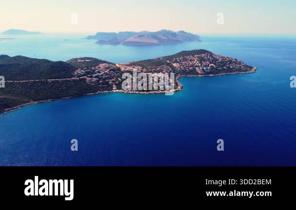 Aerial drone approach to a luxury peninsula with upscale villas in Kas ...