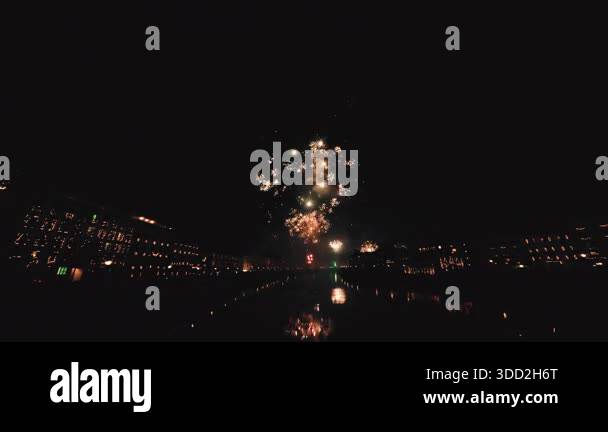 fireworks explode over the river Stock Video Footage - Alamy