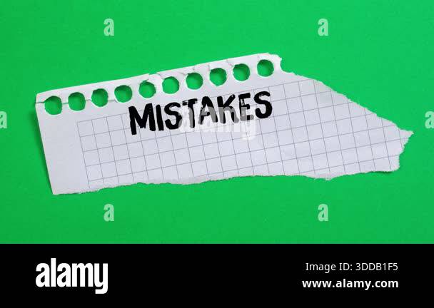Mistakes to avoid message writing on ripped torn paper background Stock ...