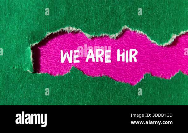 We are hiring message writing on ripped torn paper background Stock ...