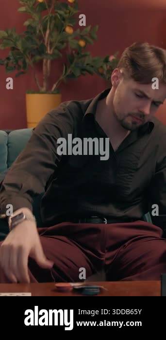Frustrated sad drunk Caucasian man gambler throwing poker cards losing ...