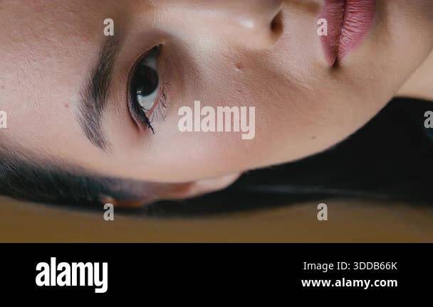 Vertical view Asian Korean woman vision problem blinking dark eyes ...
