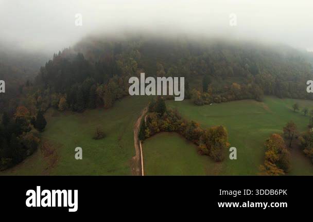 Drone aerial scenery of the valley and mountain landscape covered with ...