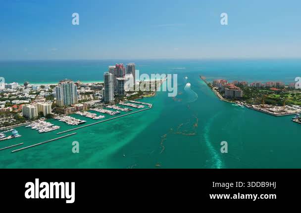 Miami turquoise waterfront, showing speedboats moving through the ...