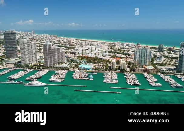 Aerial view of a modern marina filled with luxury yachts and boats ...