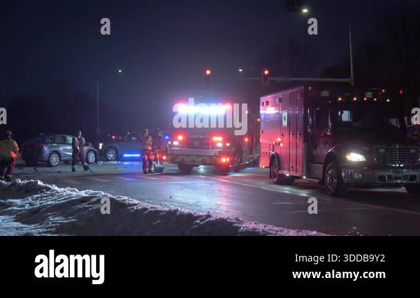 Nighttime scene of multiple emergency vehicles responding. Police cars ...