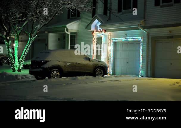 Establishing shot of townhome house with nice Christmas decoration at ...