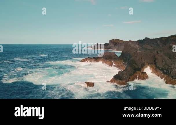 Aerial Azores Coastline With Crashing Waves, Black Volcanic Cliffs And ...