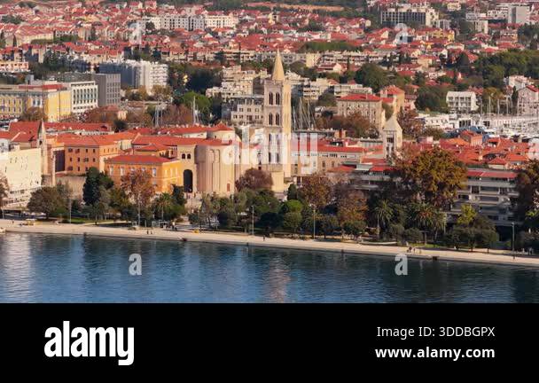 Aerial drone view of Zadar's waterfront and historic Old Town, with St ...