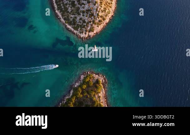 Aerial drone view of the Tribunj archipelago showing vibrant turquoise ...