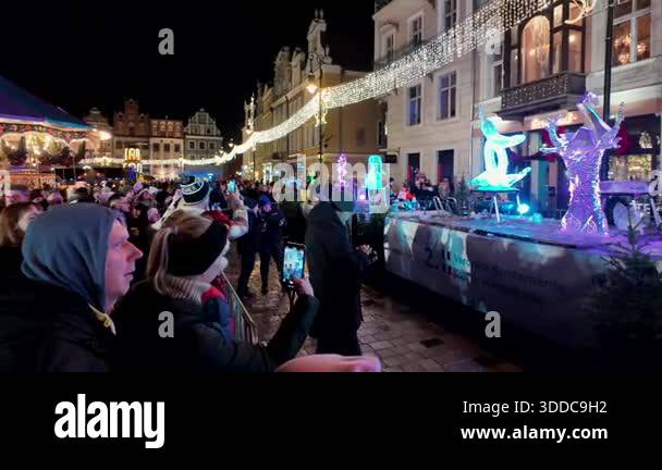 Poznan, Poland, December 12 2025: Evening walk in the city center ...