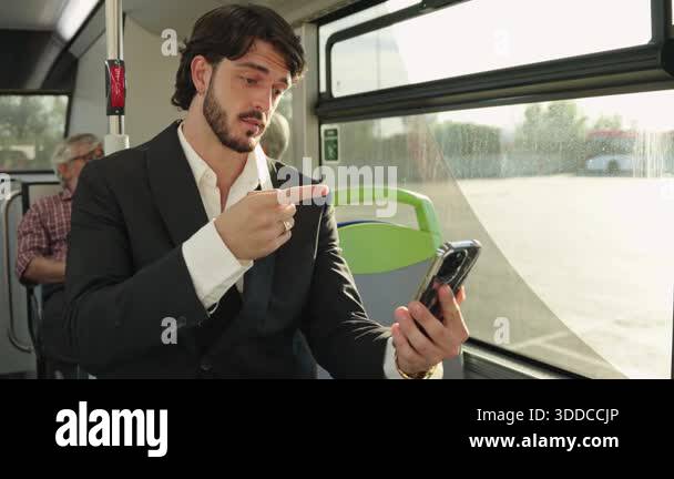 Well-dressed businessman communicating in sign language during a video ...