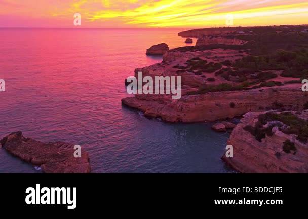 Rocks near Albandeira Beach, Cliffs and Atlantic Ocean at Sunset ...