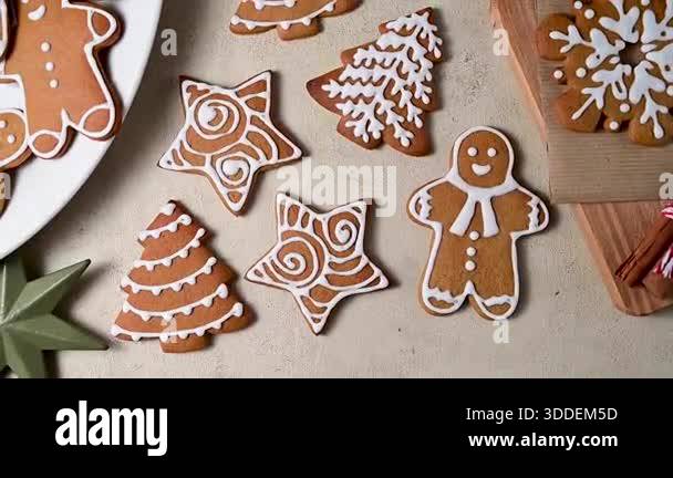 Holiday background. Christmas gingerbread cookies with icing in a plate ...