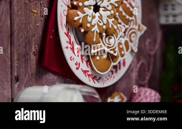 Holiday background. Christmas gingerbread cookies with icing in a plate ...