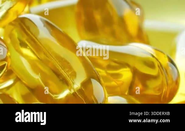 Golden Omega-3 Fish Oil Capsules Macro Closeup Stock Video Footage - Alamy