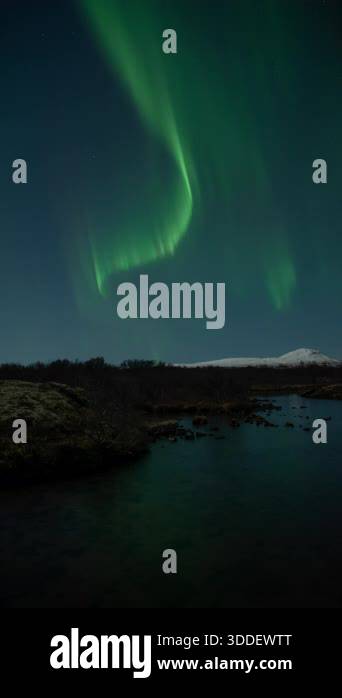 Aurora borealis moonlight landscape Thingvellir lake Iceland Stock ...