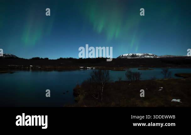Aurora borealis moonlight landscape Thingvellir lake Iceland Stock ...