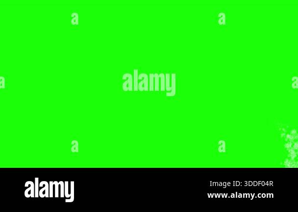 Soft white particles dispersing across a bright green chroma key ...