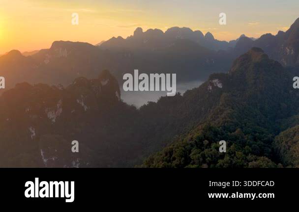 Witness stunning sunrise illuminating misty Stock Videos & Footage - HD ...