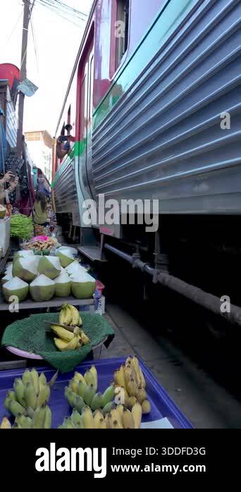 Maeklong Railway Market, Thailand, 7 December 2025, as local vendors ...