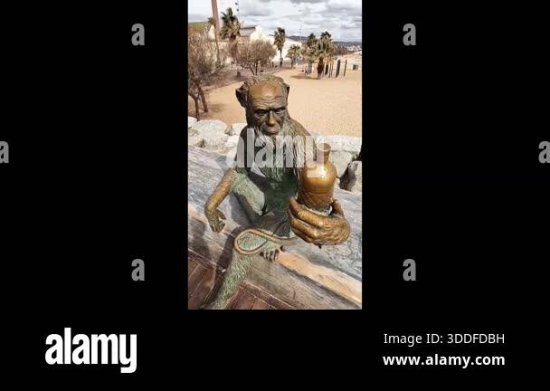 Famous Anis del Mono monkey statue on the promenade with factory ...