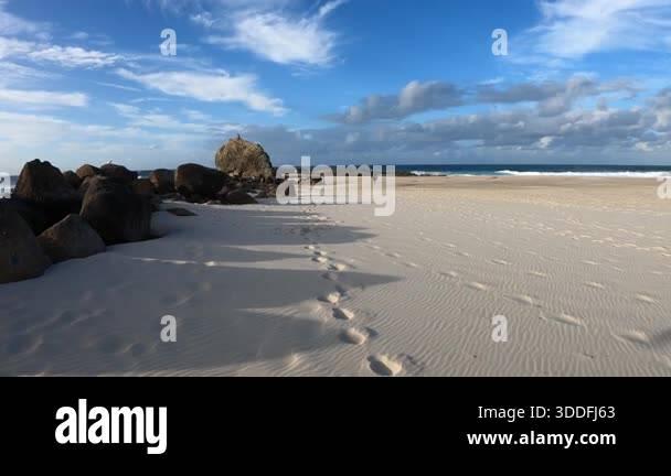 Beach scene with changing cloud patterns and shadows Stock Video ...