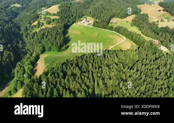 Drone view Drava riverside hills in summer, Gortina village, deep green ...