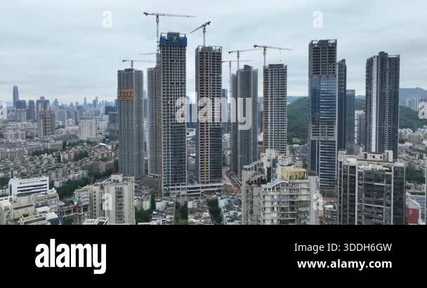 Shenzhen, China - April 09, 2024: Aerial footage of construction site ...