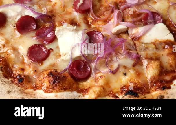 Italian pizza with sausage, chicken, and cheese for dinner. Sausage ...