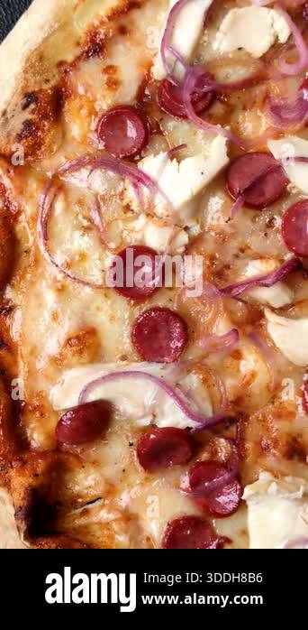 Italian pizza with sausage, chicken, and cheese for dinner. Sausage ...