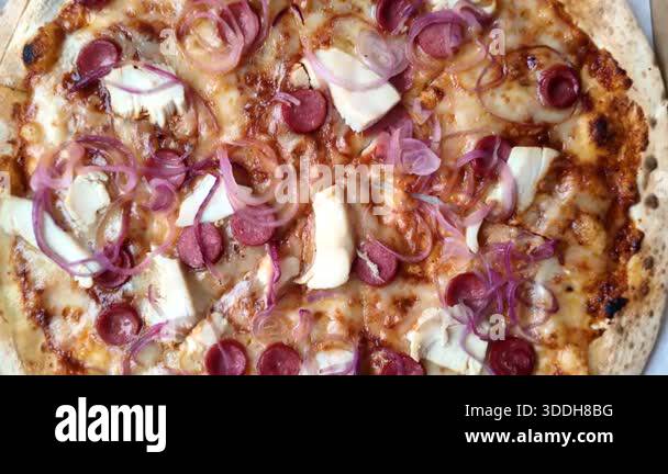 Italian pizza with sausage, chicken, and cheese for dinner. Sausage ...