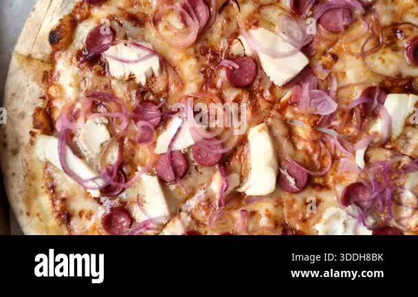 Italian pizza with sausage, chicken, and cheese for dinner. Sausage ...