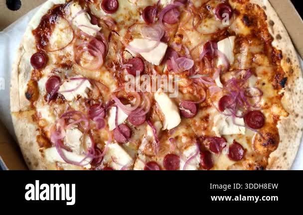 Italian pizza with sausage, chicken, and cheese for dinner. Sausage ...