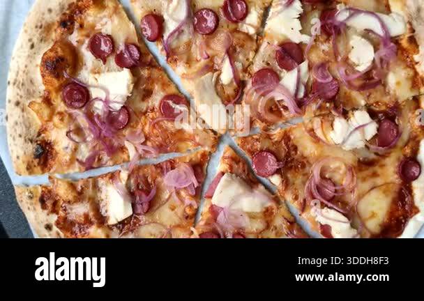 Italian pizza with sausage, chicken, and cheese for dinner. Sausage ...