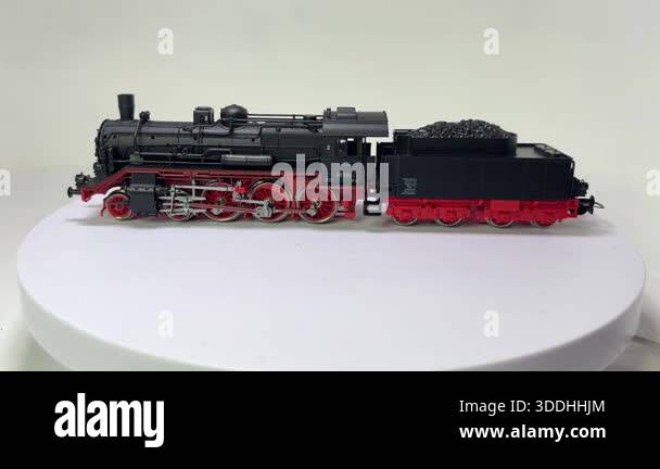 HO scale model railway featuring detailed BR38 steam locomotive based ...
