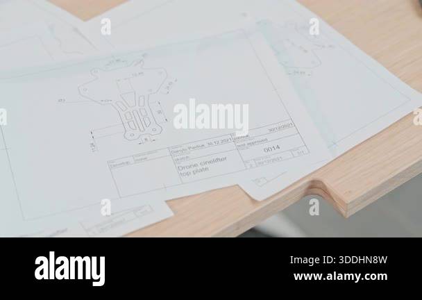 Close-up view of drawings drone on desk. Electronic first person view ...